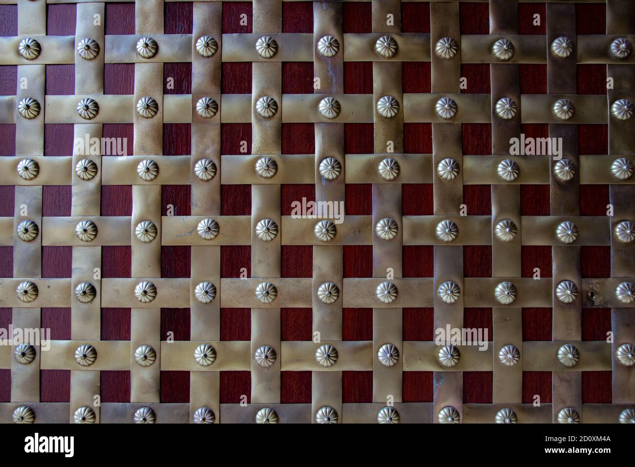 Closeup of metal grill bars and round rivets of ancient structure Stock ...