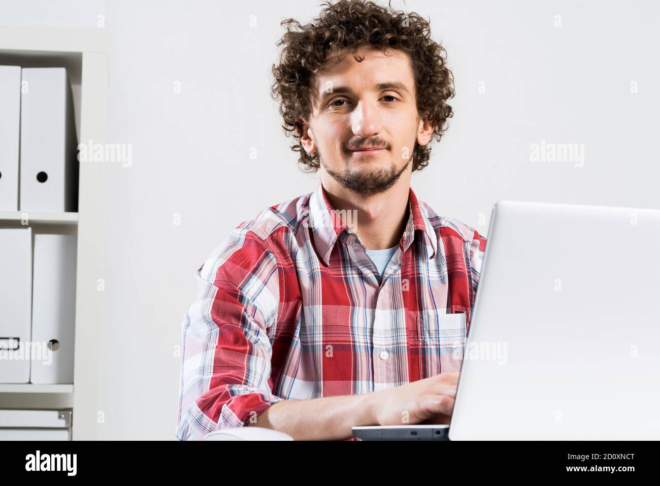 Man working in office Stock Photo - Alamy