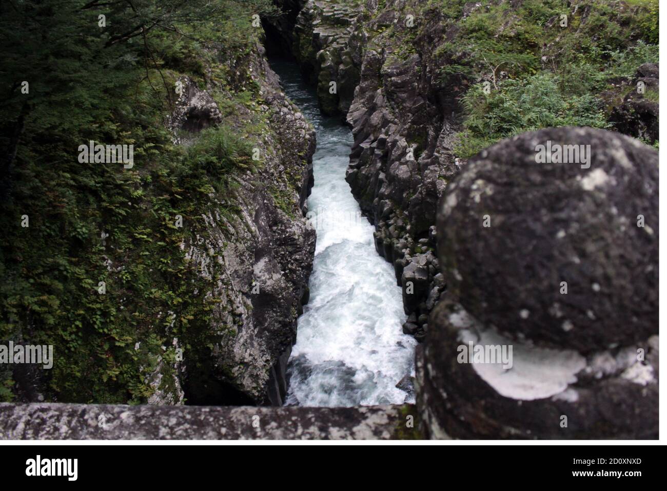 Overlooking rushing river from a bridge at Takachiho Gorge in Miyazaki ...