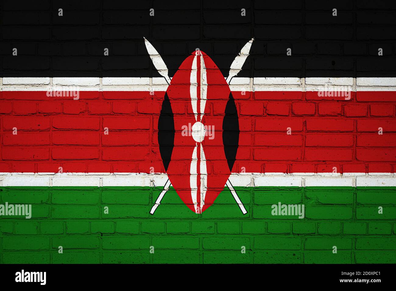 National flag of Kenya depicting in paint colors on an old brick wall ...