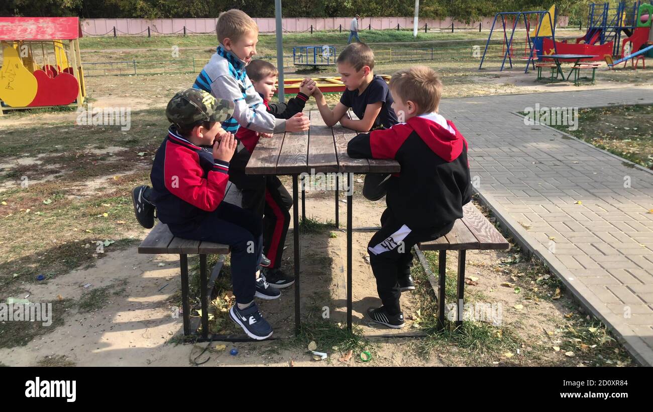 Children boys play on the old Playground at the table Stock Photo - Alamy