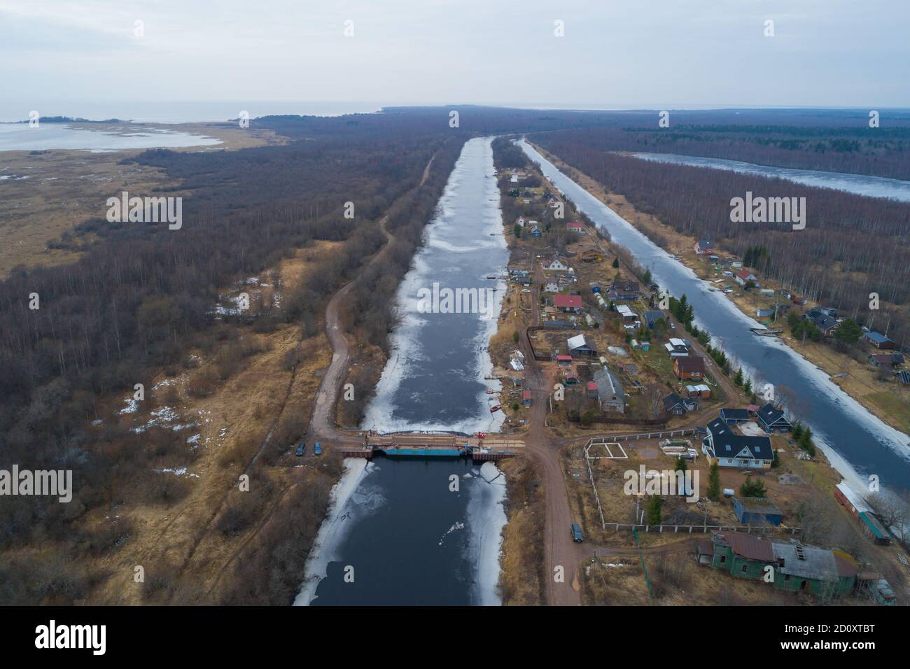 Old canals of the Mariinskaya water navigation system on a March day ...