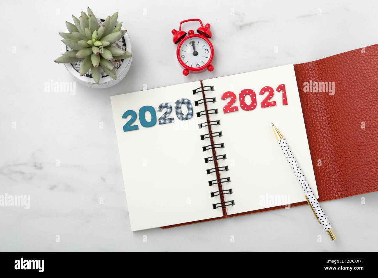 Open planner with year 2020 and 2021 on desk, top view Stock Photo - Alamy