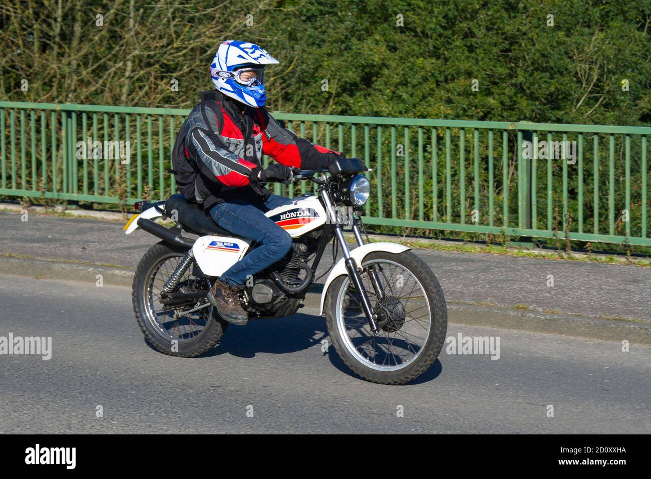 1980 80s eighties White 124cc Honda; Trial Motorbike rider; two-wheeled transport, motorcycles ...