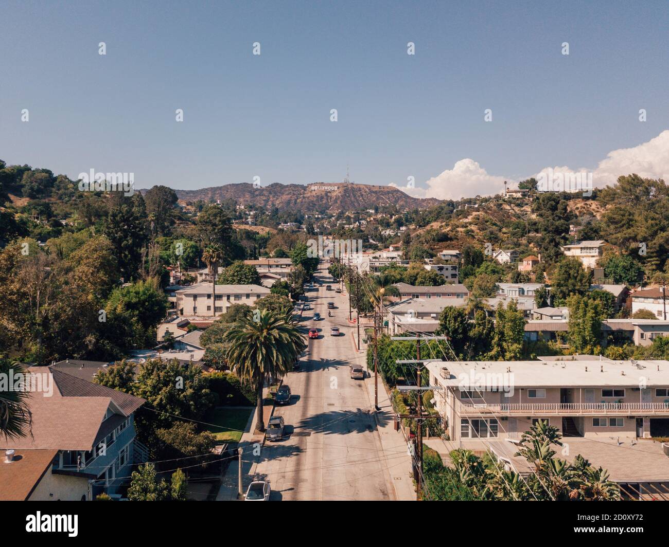 Aerial shot of Hollywood sign over the buildings in Los Angeles ...