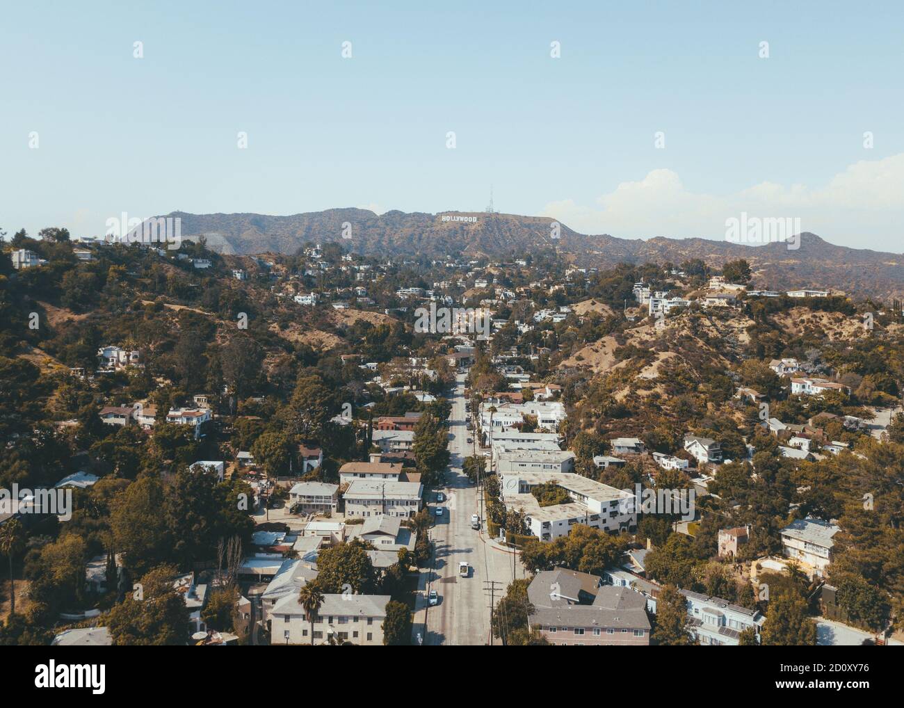 Aerial shot of Hollywood sign over the buildings in Los Angeles ...