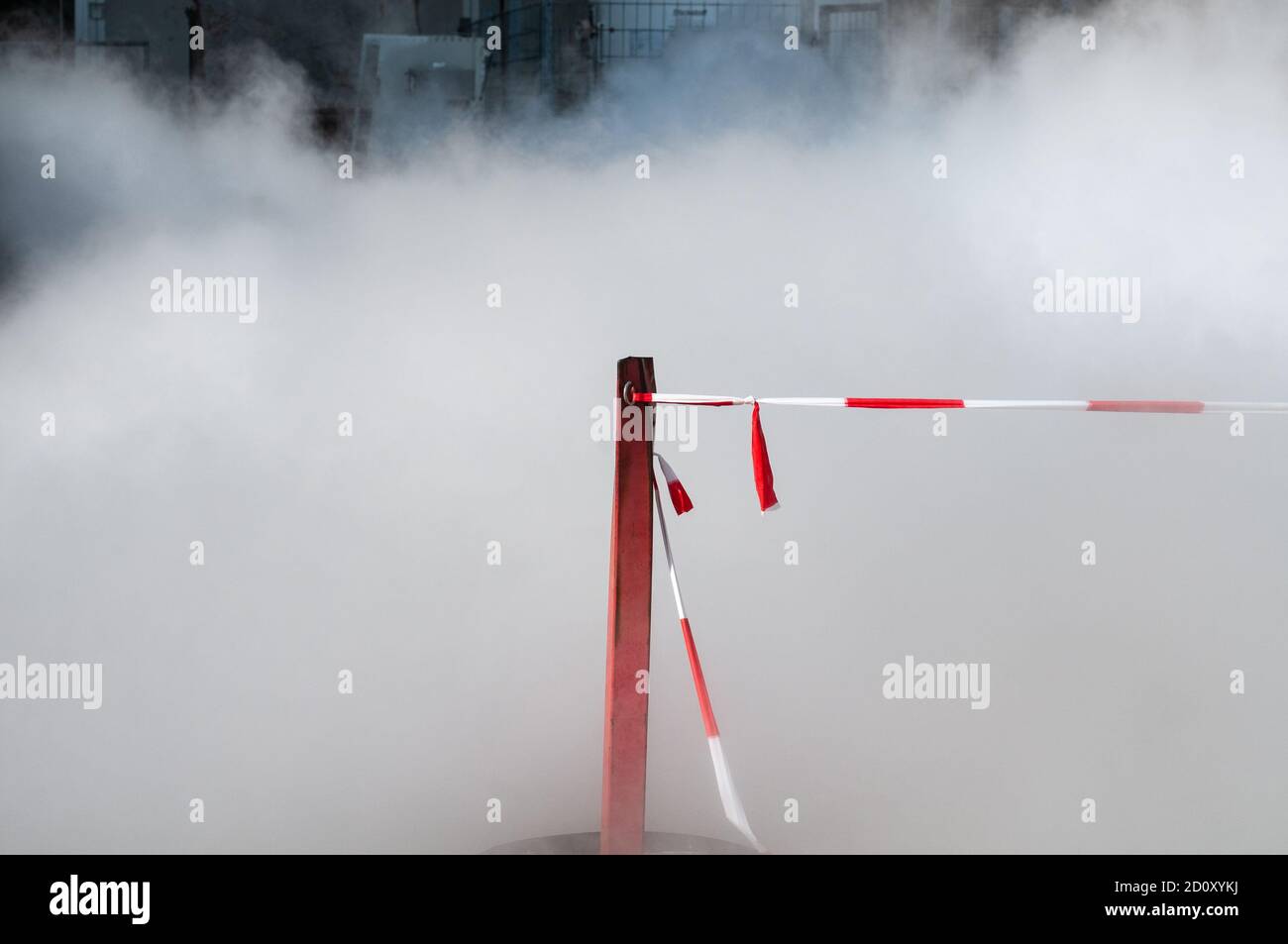 the vapour of liquid nitrogen forming white clouds at a filling station ...