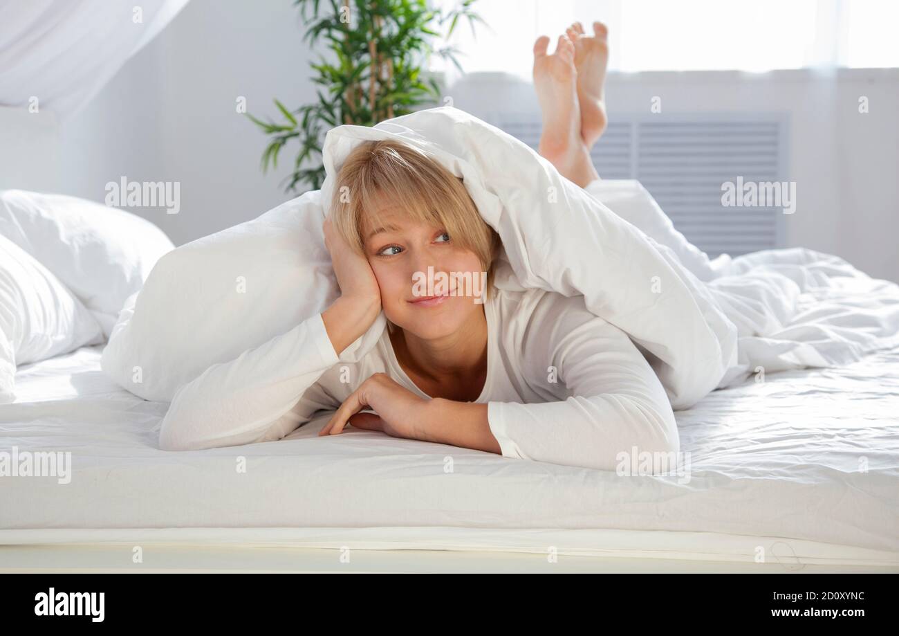 beautiful girl in the morning in bed Stock Photo - Alamy