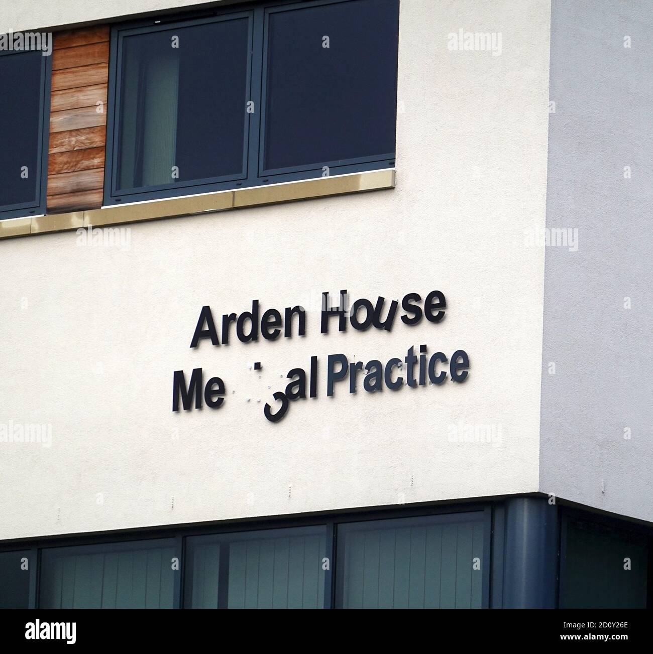 Letters have fallen off the sign showing Arden House Medical Practice ...
