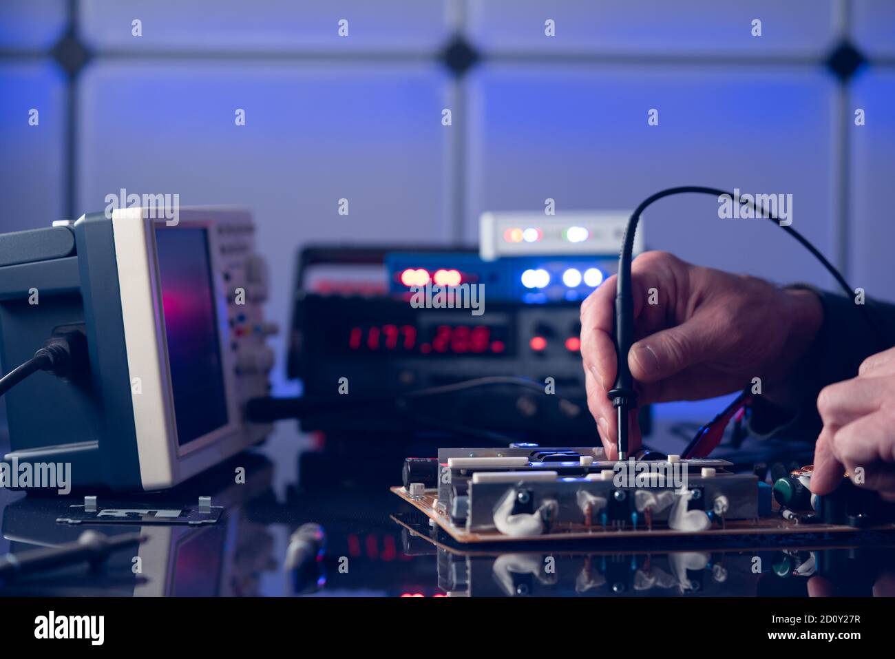 Debugging electronics device. PCB witch microcontroller in electronics ...