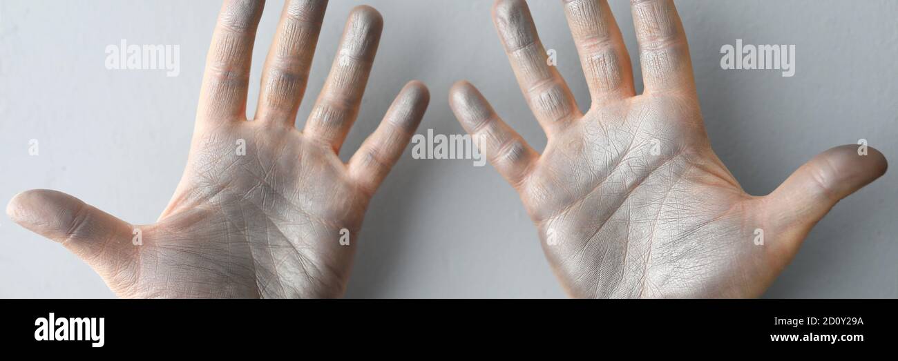 Messy hand in grey Stock Photo - Alamy