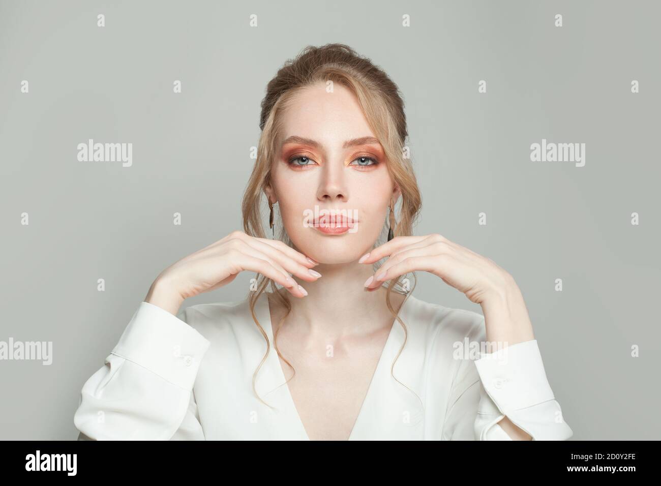 Perfect young model woman with healthy clear skin. Facial treatment and ...