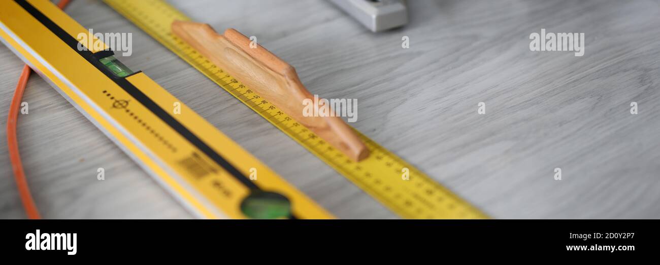 Yellow metal tool for work Stock Photo - Alamy
