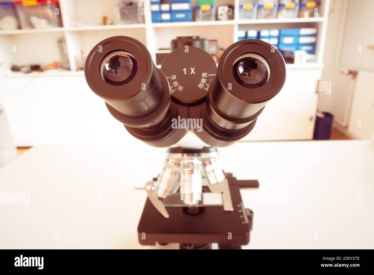 Laboratory microscope with blurred background Stock Photo - Alamy