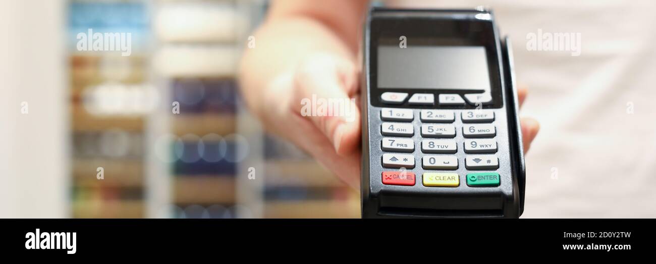 Store worker with device Stock Photo - Alamy