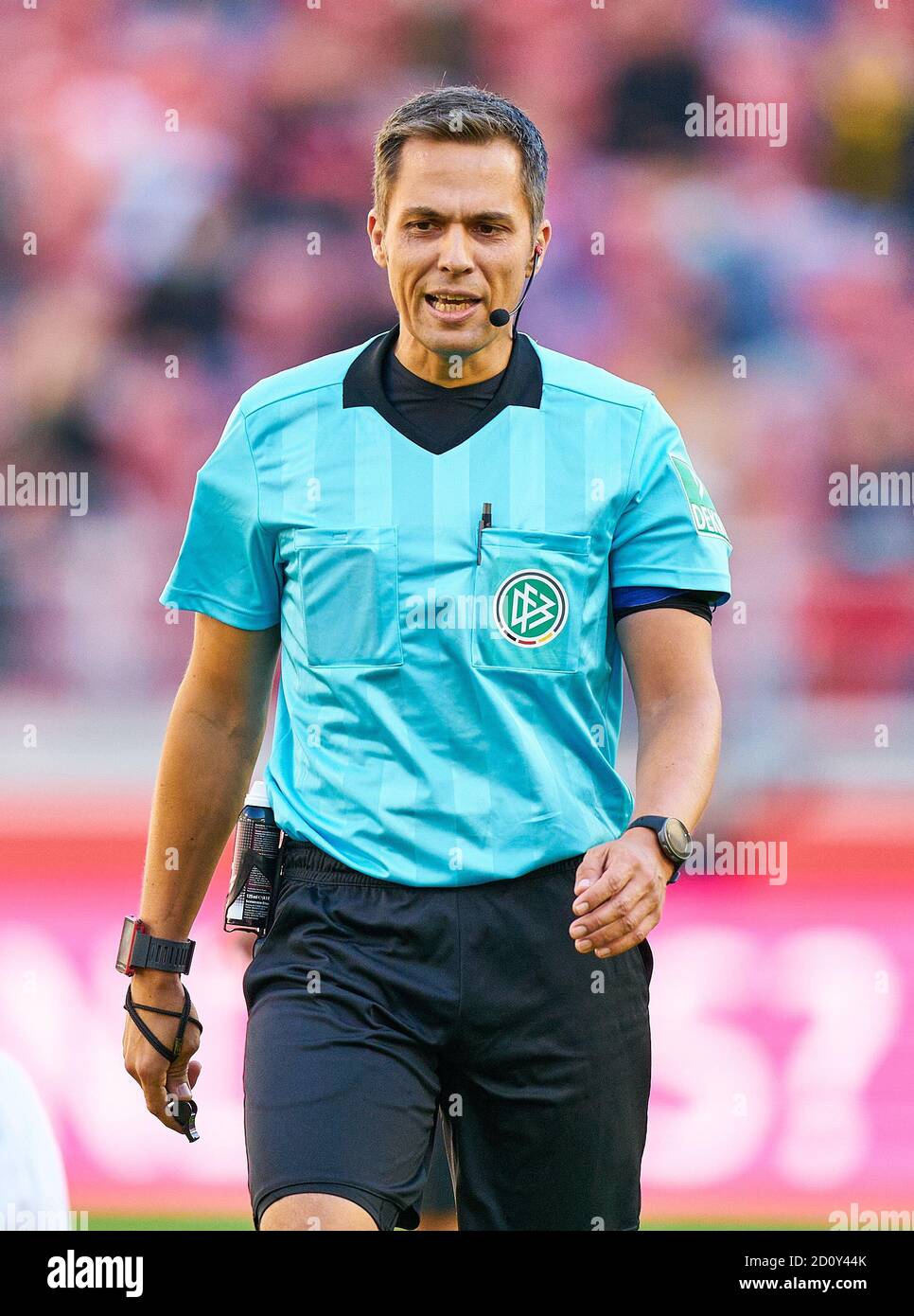Referee robert hartmann with whistle hi-res stock photography and ...
