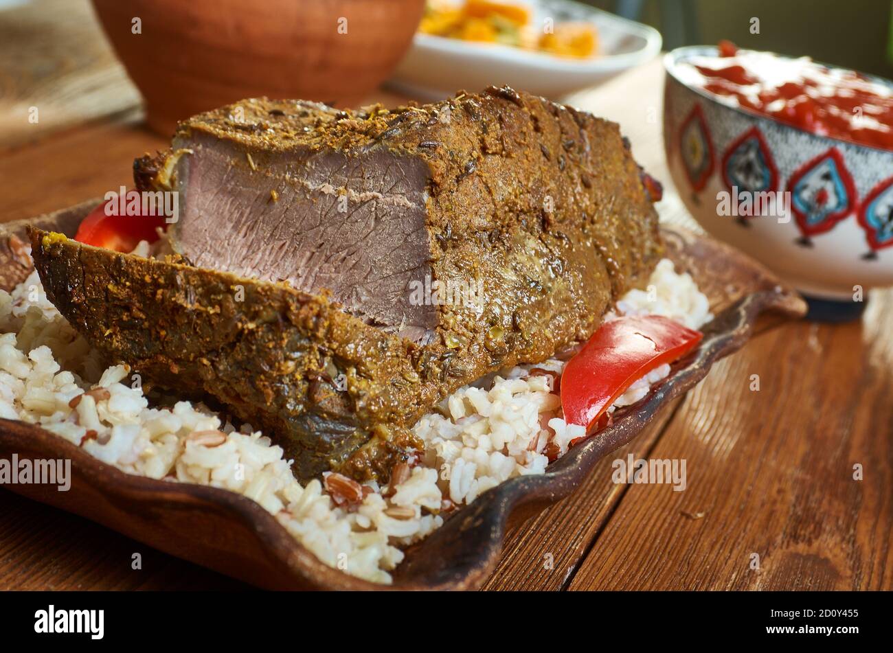 Shuwa - national dish of Oman, prepared with bone-in cuts of lamb or ...
