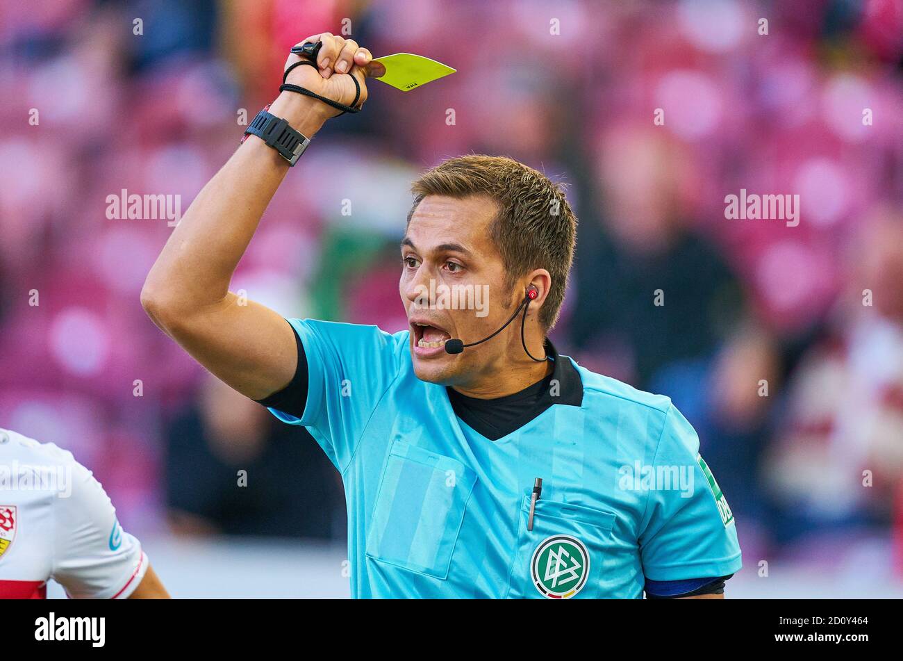 Referee robert hartmann with whistle hi-res stock photography and ...
