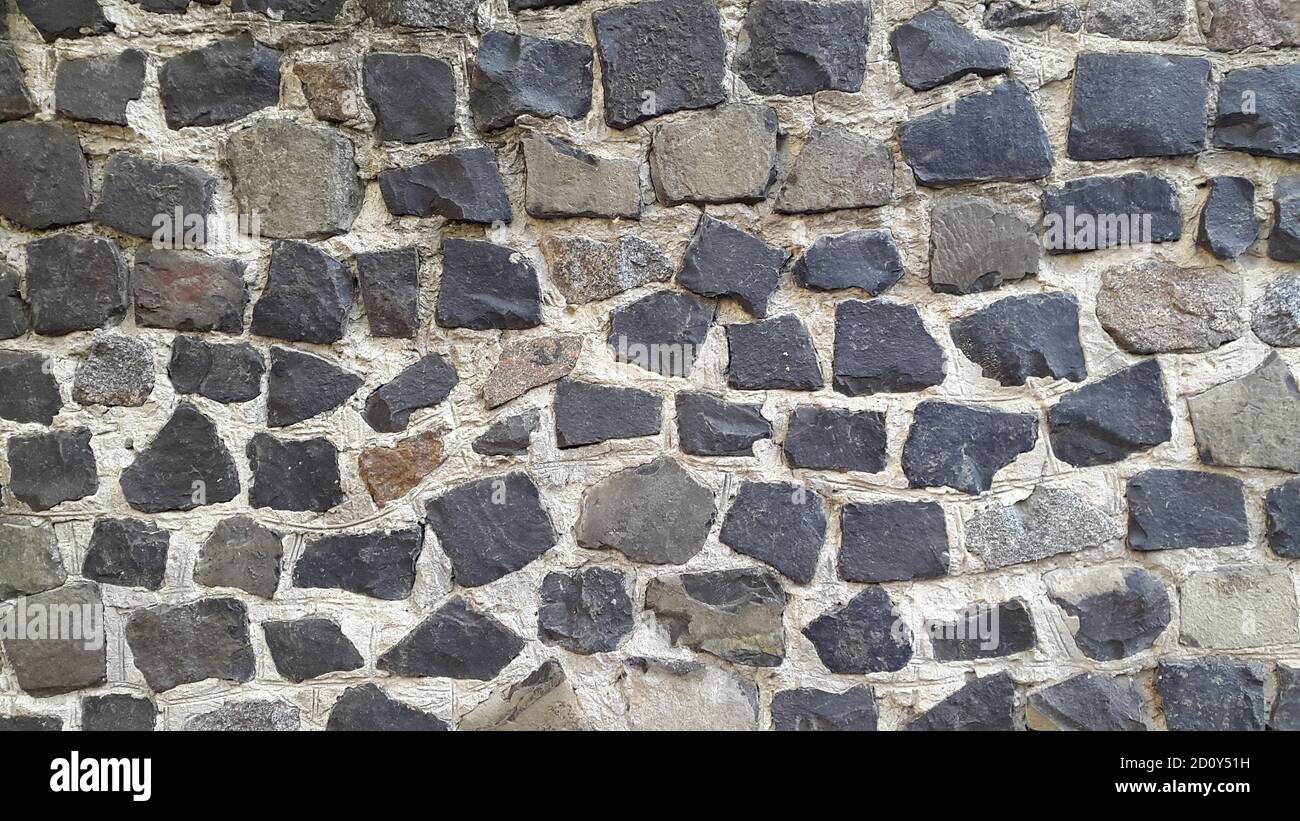 Wall of granite stones. Masonry. Vintage granite background Stock Photo ...