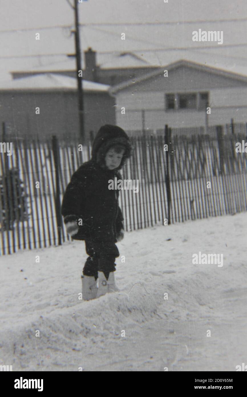 Fine 1970s vintage black and white photography of a young girl playing ...