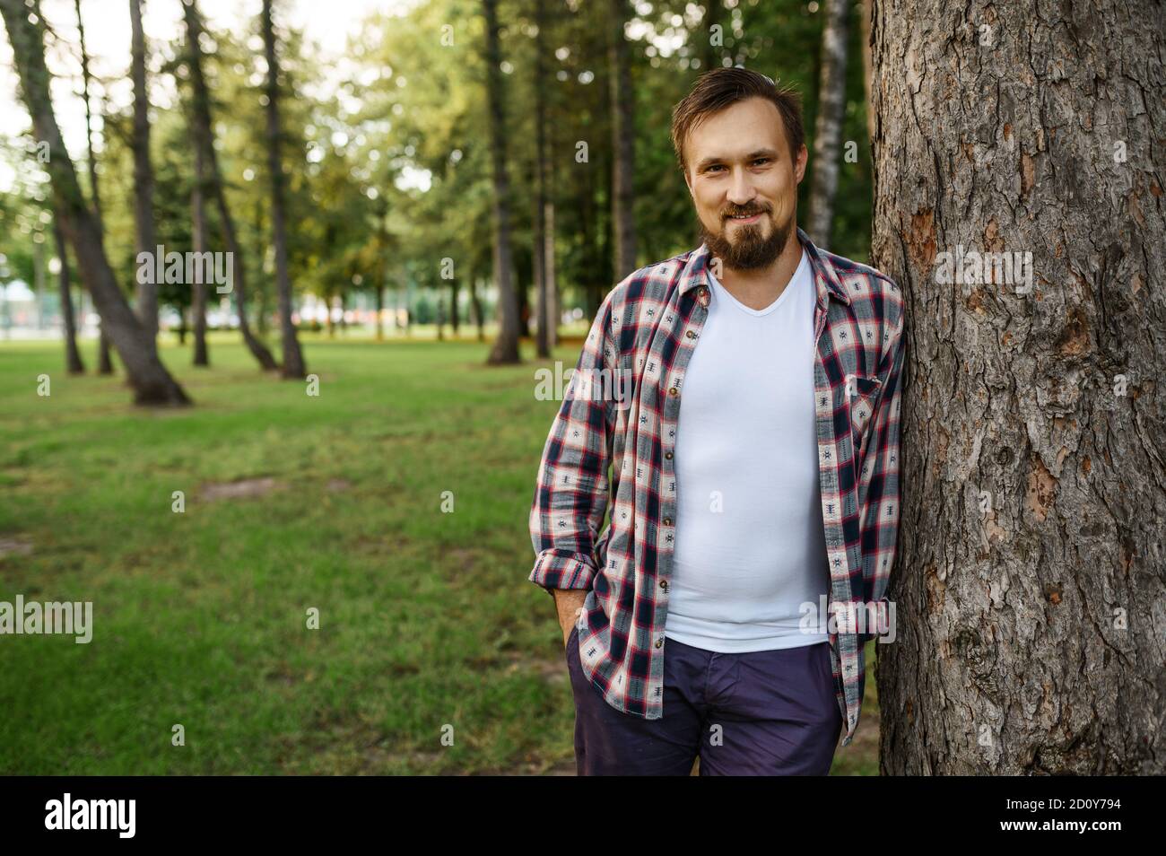 Man standing under tree hi-res stock photography and images - Alamy