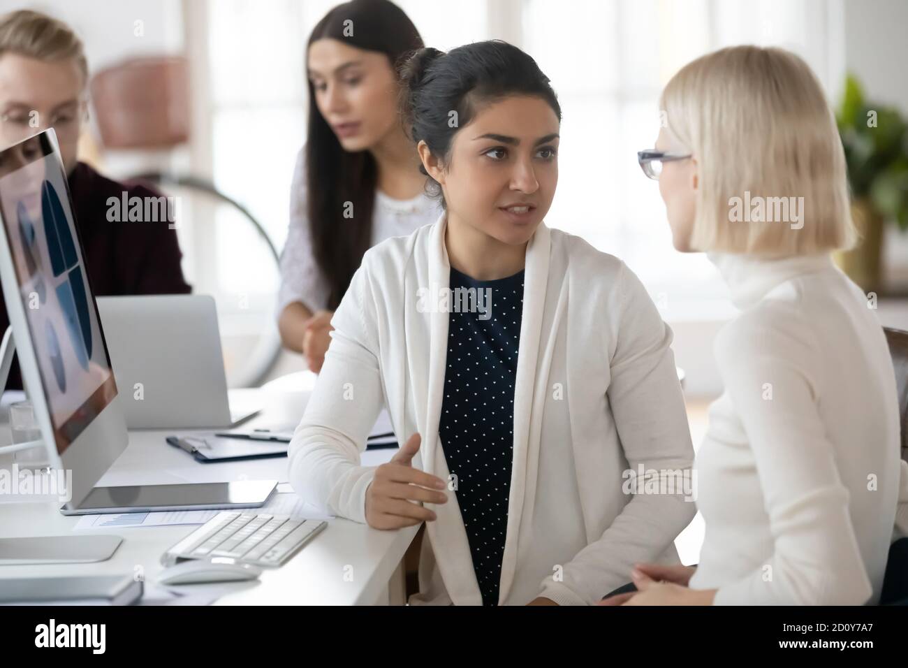 Group multiracial colleagues talking using hi-res stock photography and ...