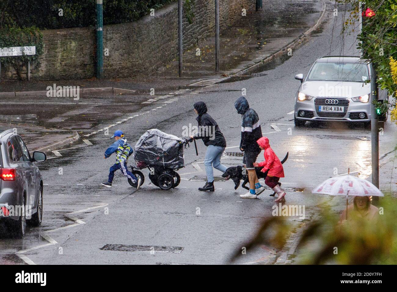 Chippenham, Wiltshire, UK. 4th October, 2020. Pedestrians are pictured ...