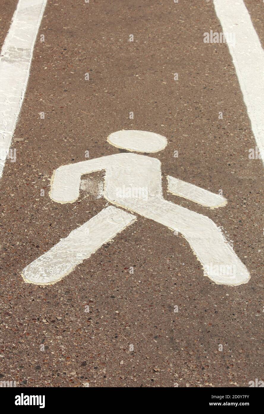 White painted sign of footpath on asphalt. Street signs Stock Photo - Alamy