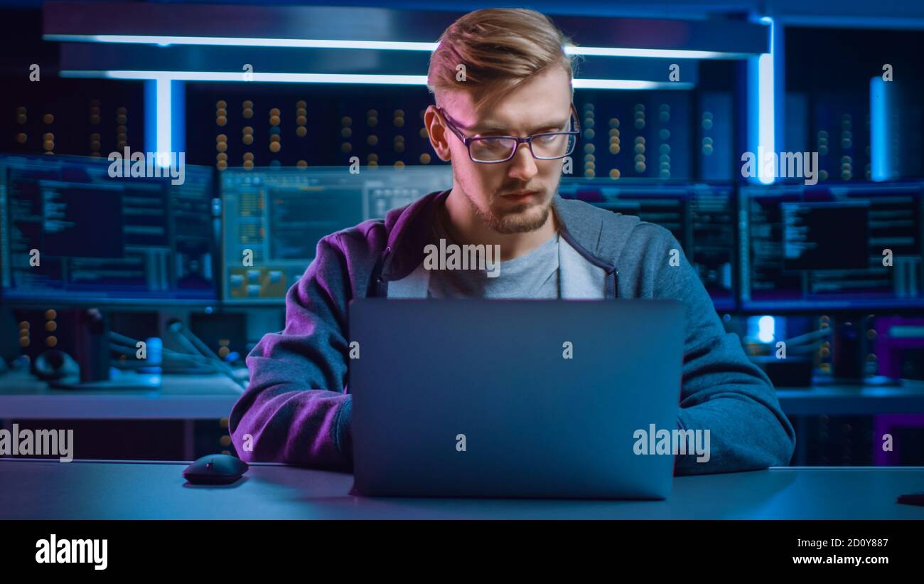 Hacker typing on futuristic computer hi-res stock photography and ...