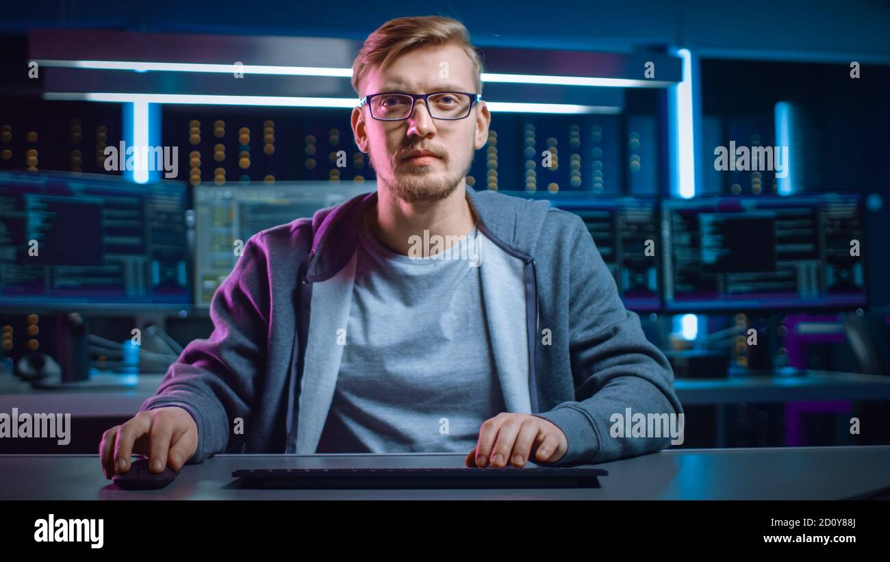 Portrait of Software Developer Hacker Wearing Glasses Sitting at His ...