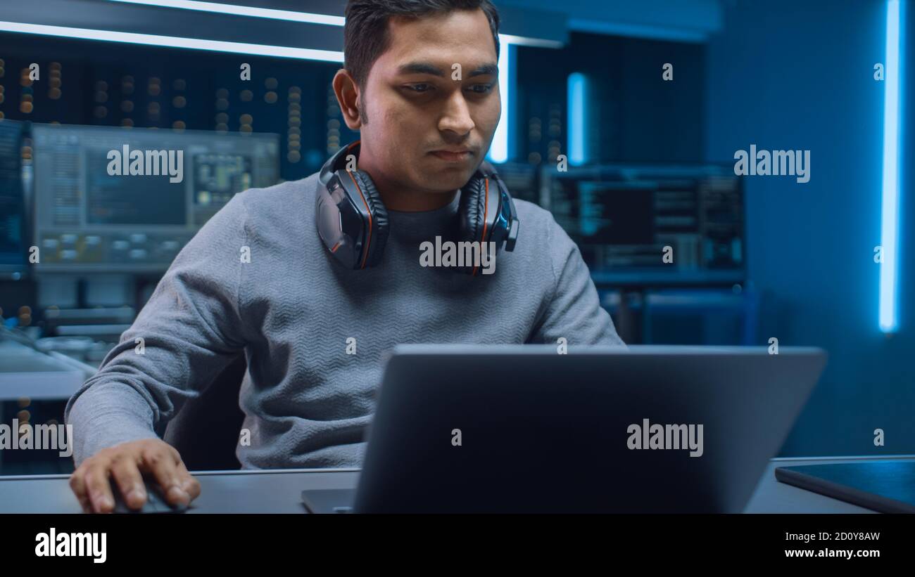 Hacker typing on futuristic computer hi-res stock photography and ...