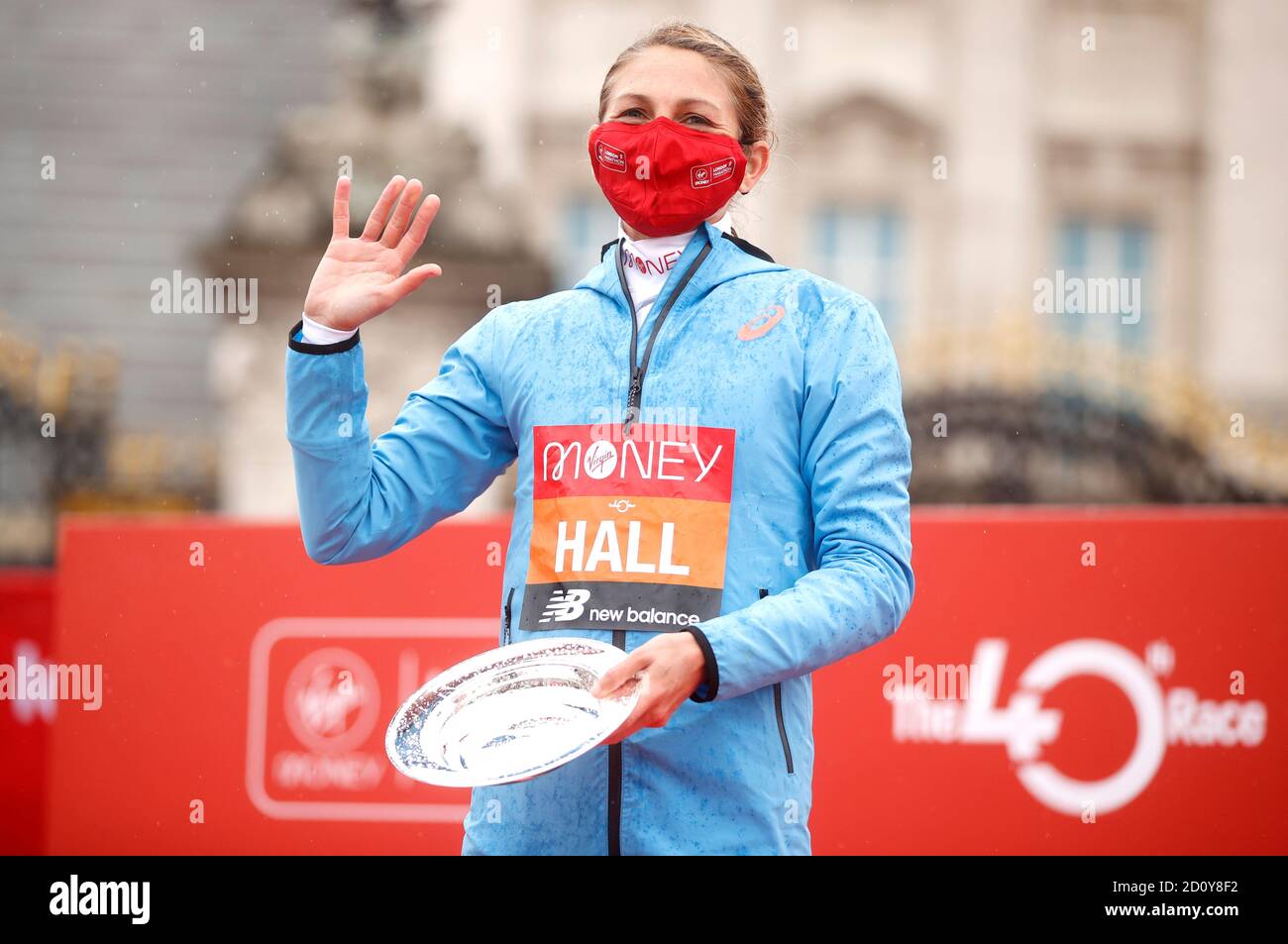 USA's Sara Hall poses with her trophy after the Women's Elite Race ...