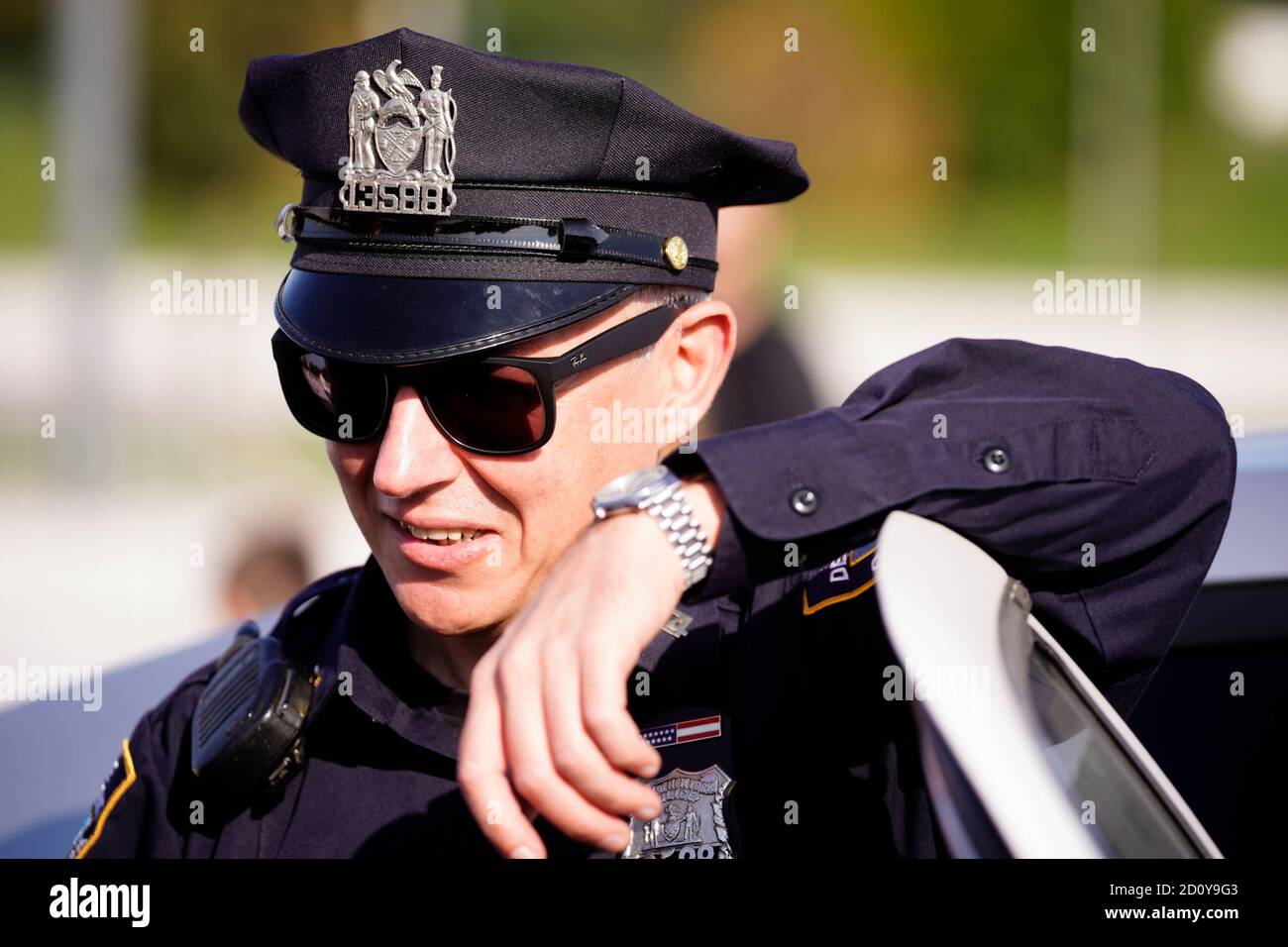 A man dressed as an American police officer is seen during the American ...