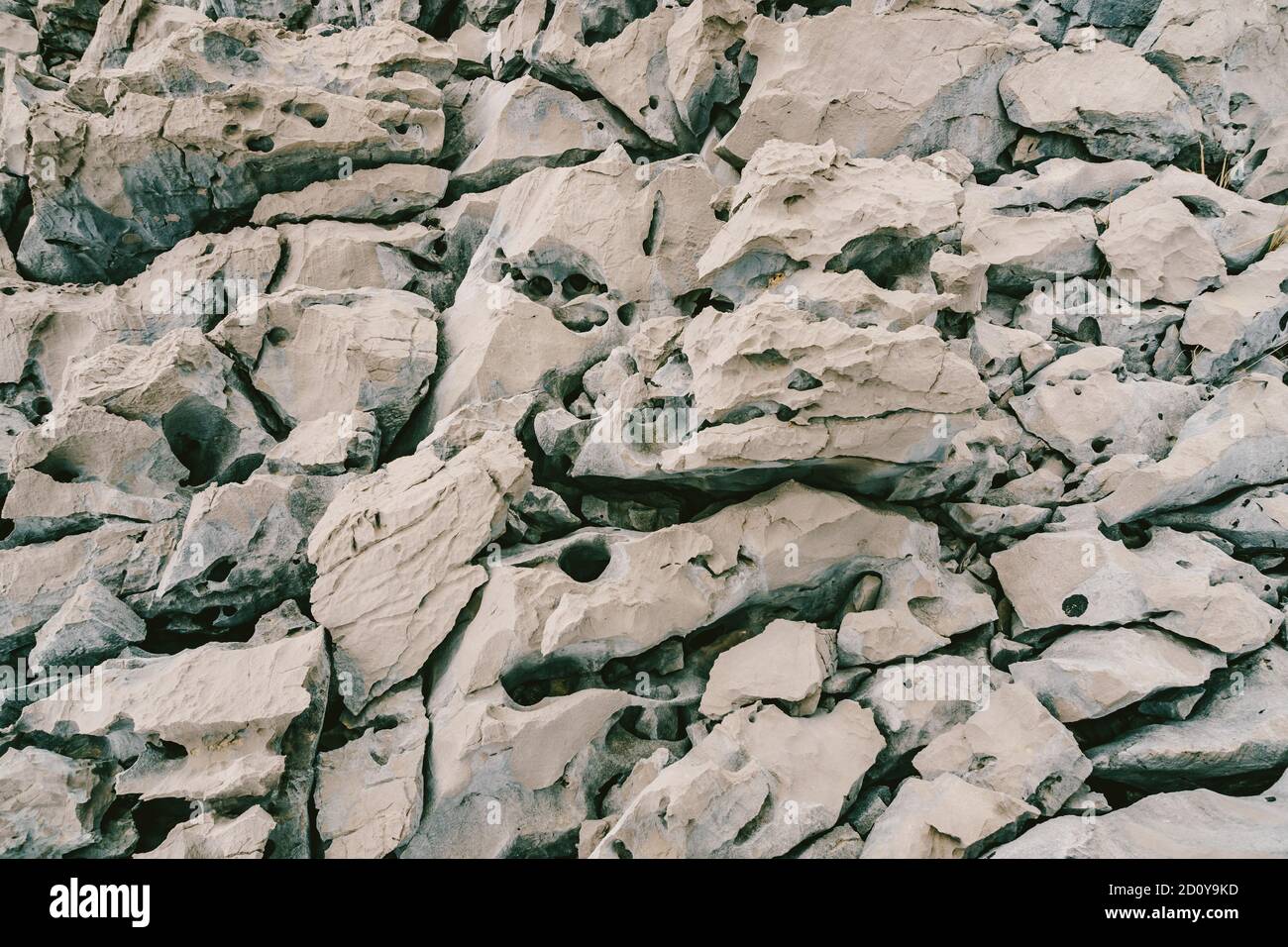 Sharp rocks with voids and holes on the Adriatic coast in Montenegro ...