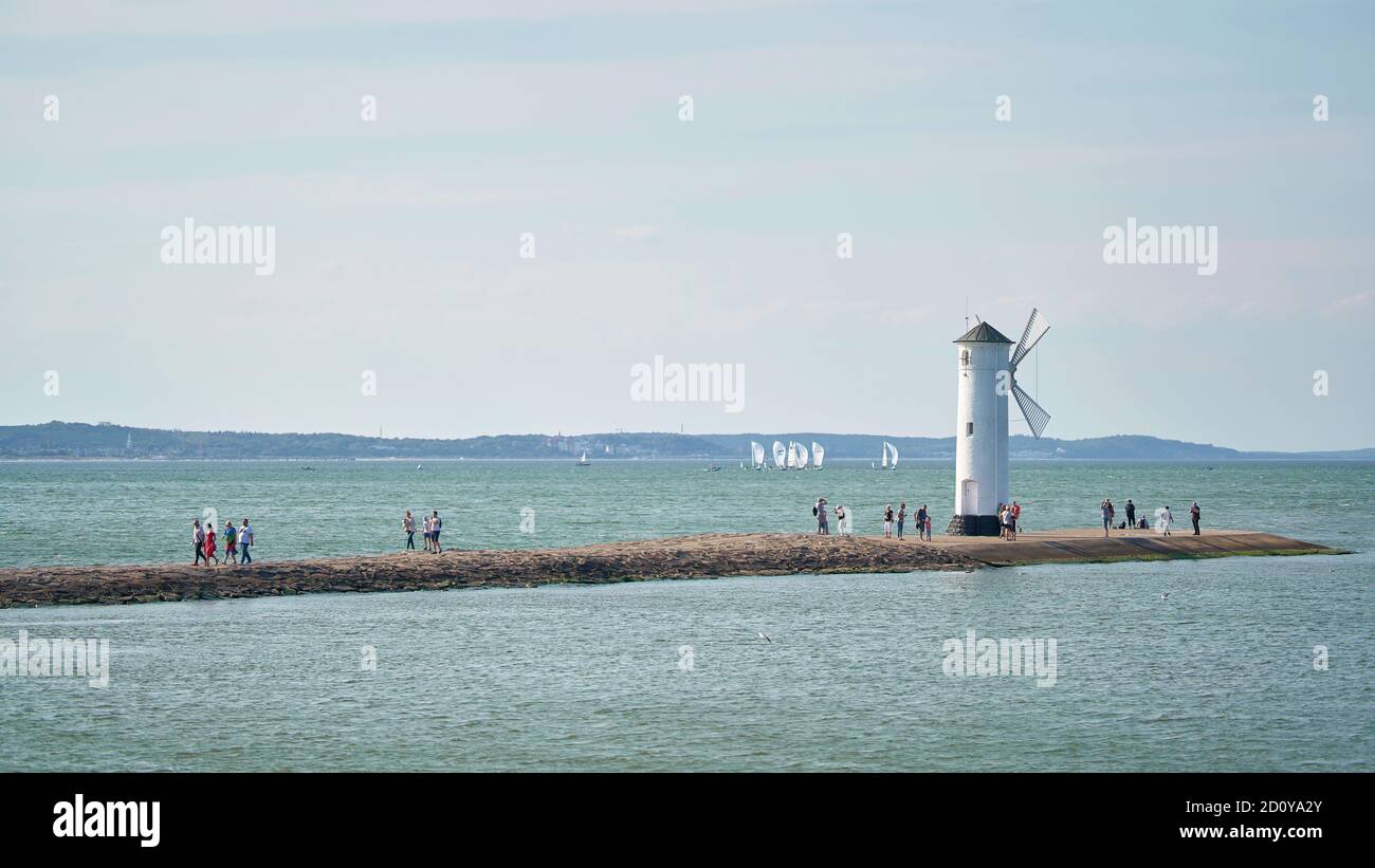 The windmill fire on the shore of the Baltic Sea coast, the symbol of ...