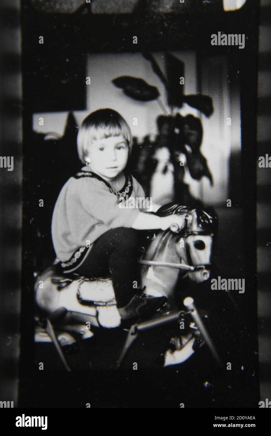 Fine 1970s vintage black and white photography of a young girl riding a ...
