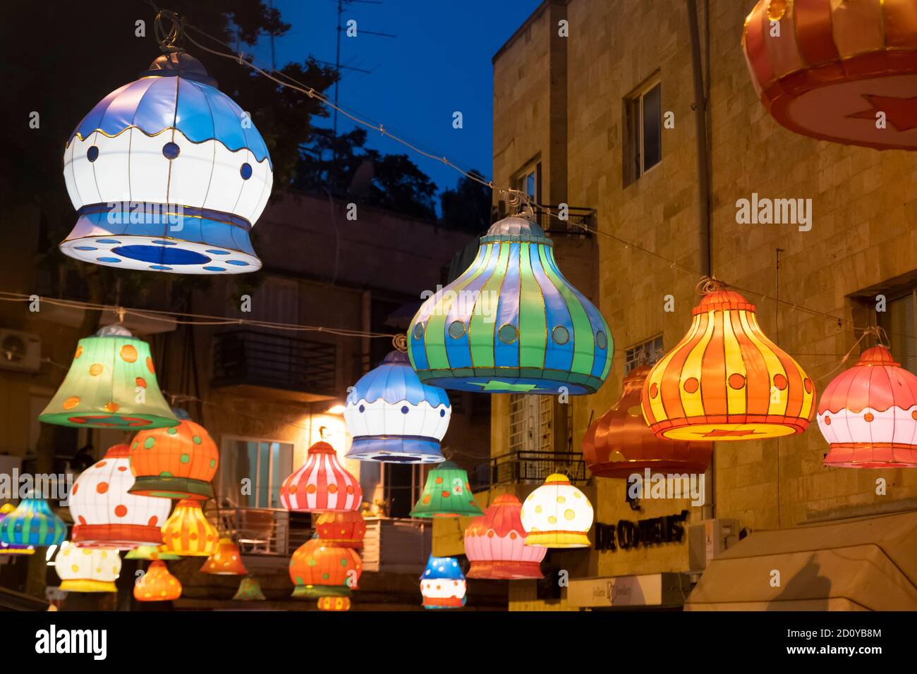 Decorative lamps hanging over a street in downtown Jerusalem Israel ...