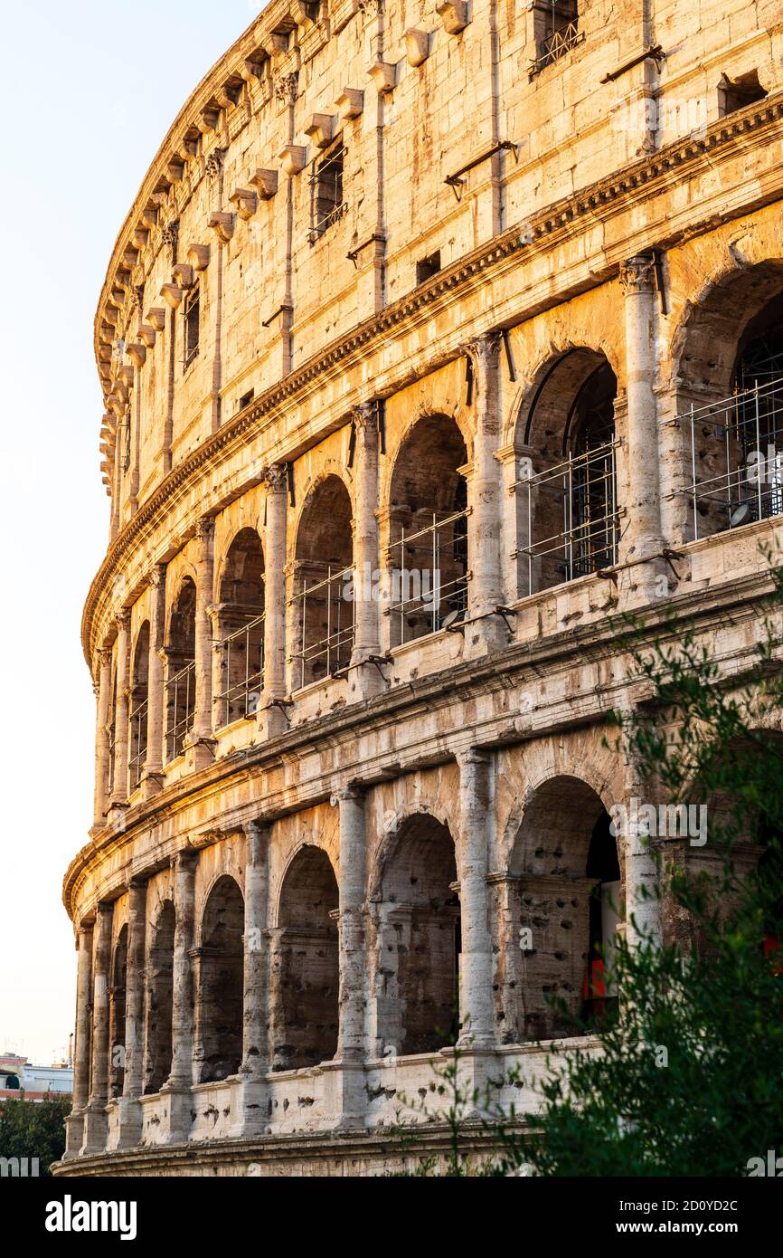 Section of the Roman Colosseum in the early morning light with the dawn ...