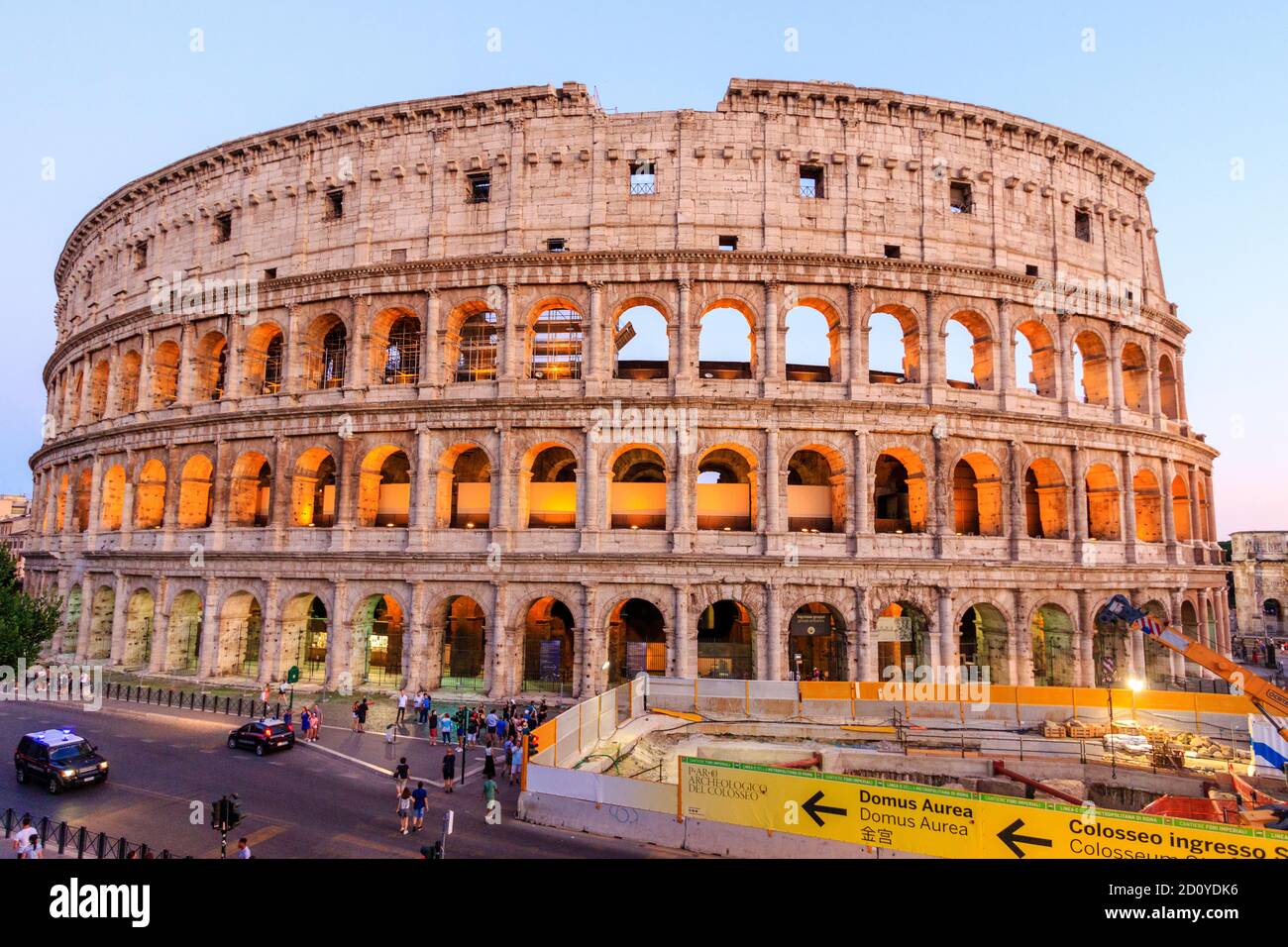 The illuminated Roman Colosseum in rome during the blue hour in the ...