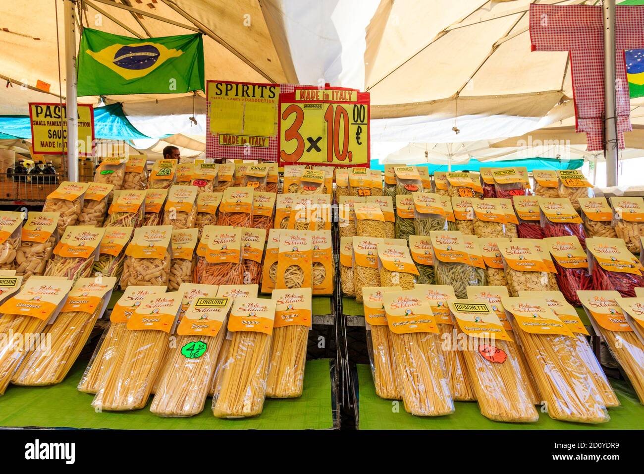 Close up of a market stall display of packets of various types of ...