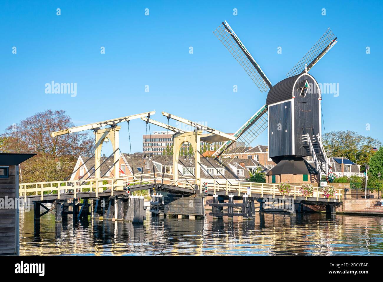 Windmill "De Put" and drawbridge "Rembrandtbrug" in the historic city ...