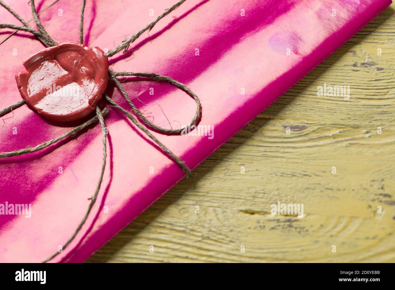 Letter with seal on table Stock Photo - Alamy