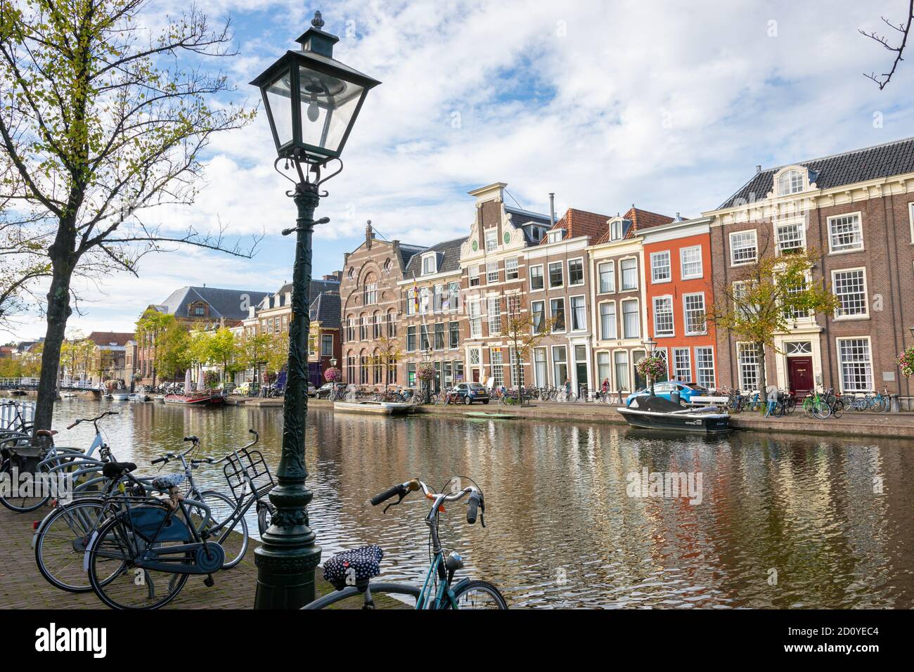 Classic dutch city scene with old canal houses in the historic city of ...
