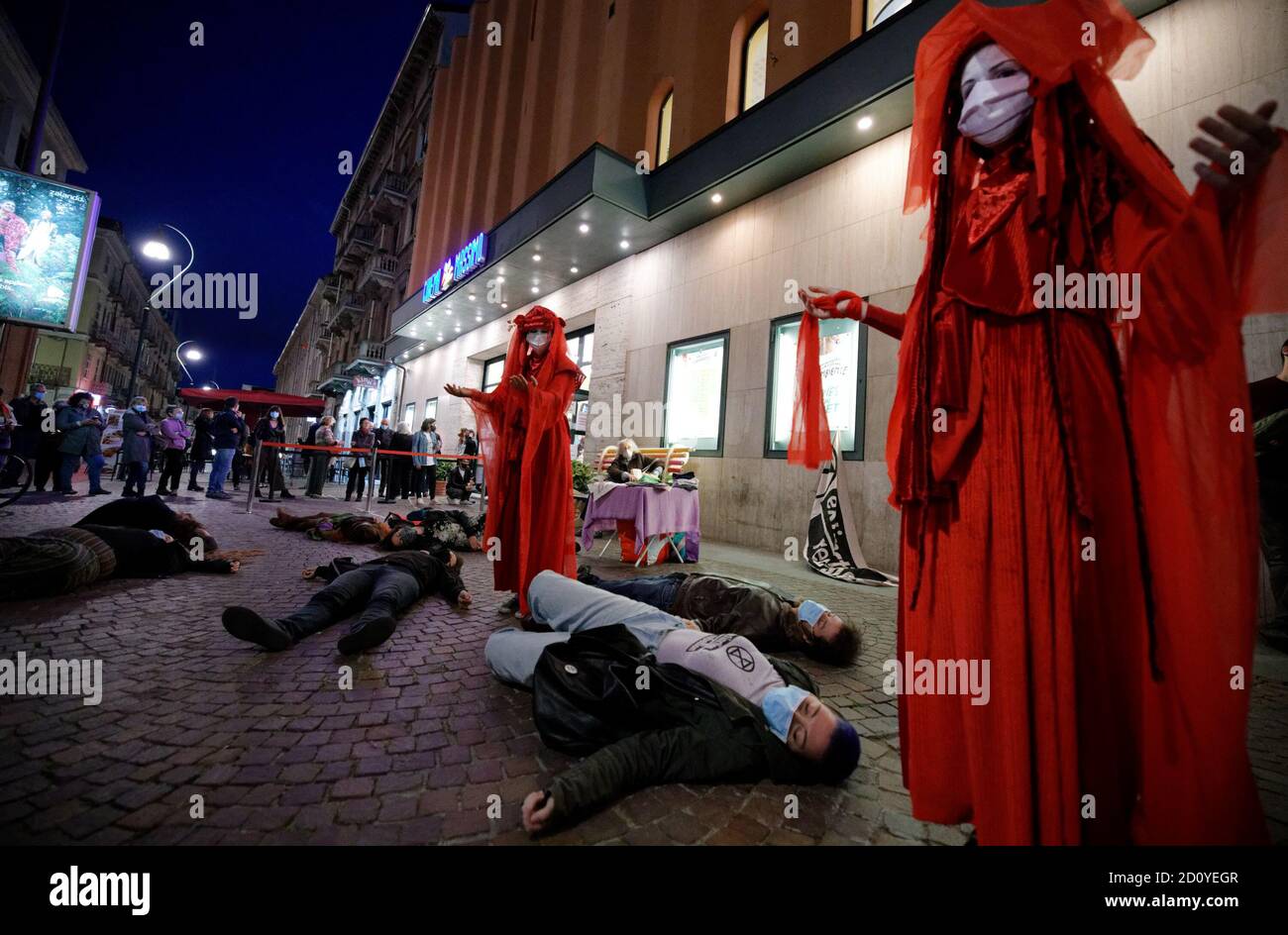 Turin, Italy. 3rd Oct, 2020. Extinction Rebellion activists perform a ...