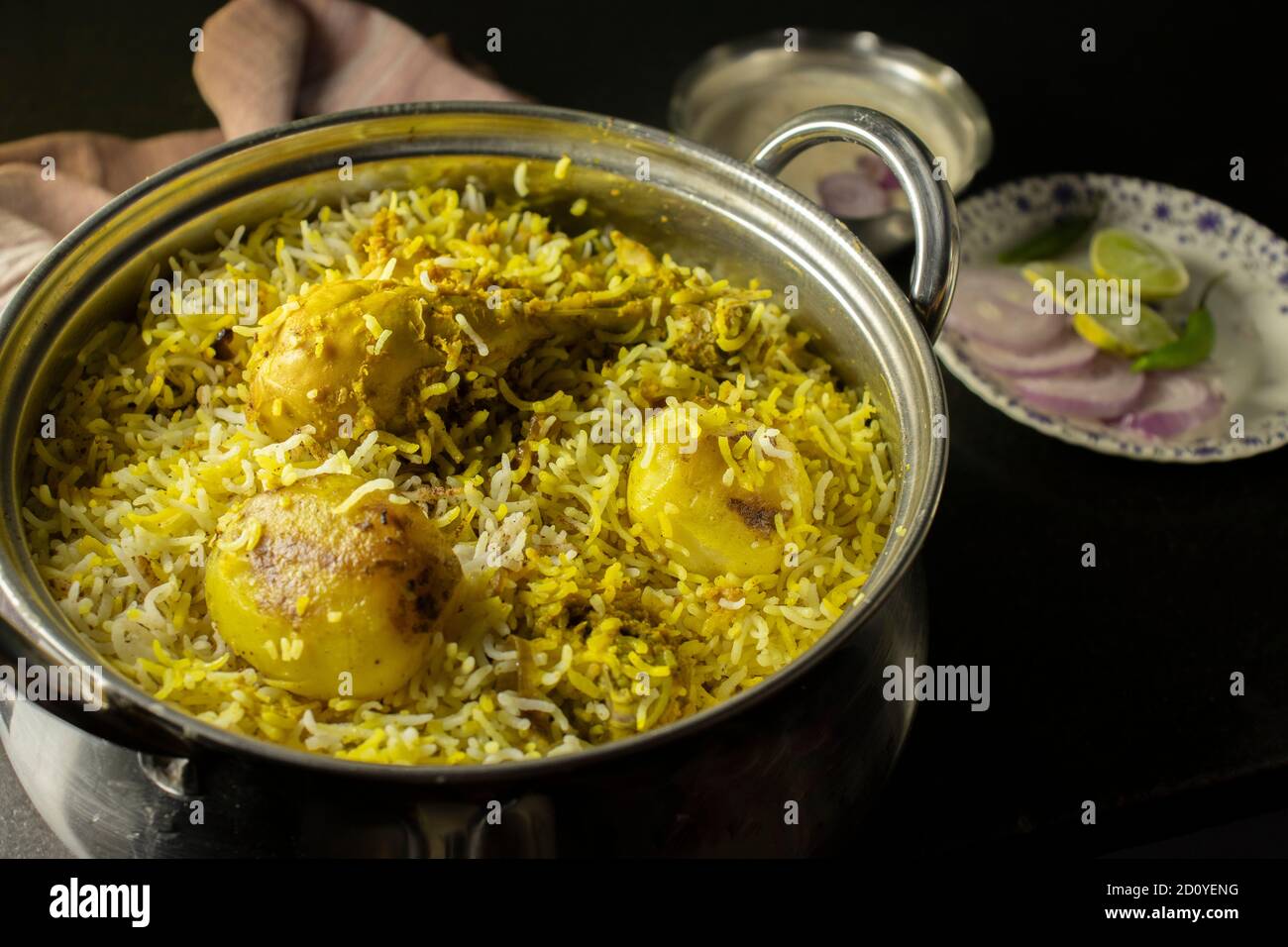 Delicious and spicy home made chicken biryani in traditional bowl with ...