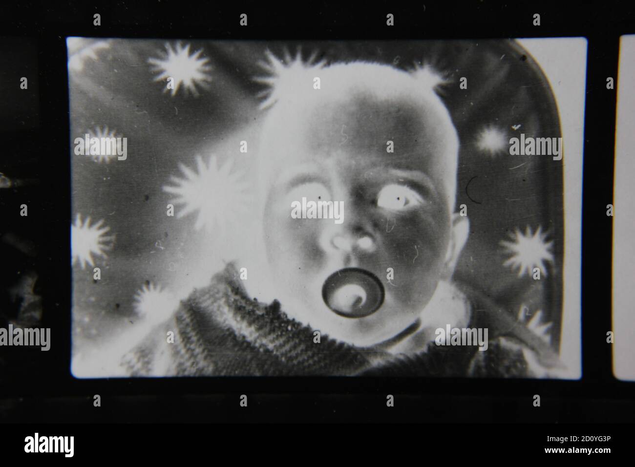 Fine 1970s vintage black and white photography of a ghost baby sucking ...