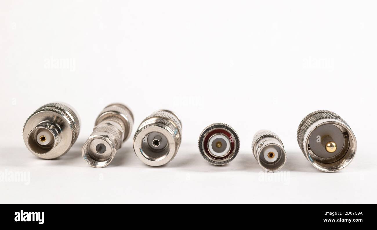 Microwave coaxial adapter UHF Male To N Female connector. Concept of ...