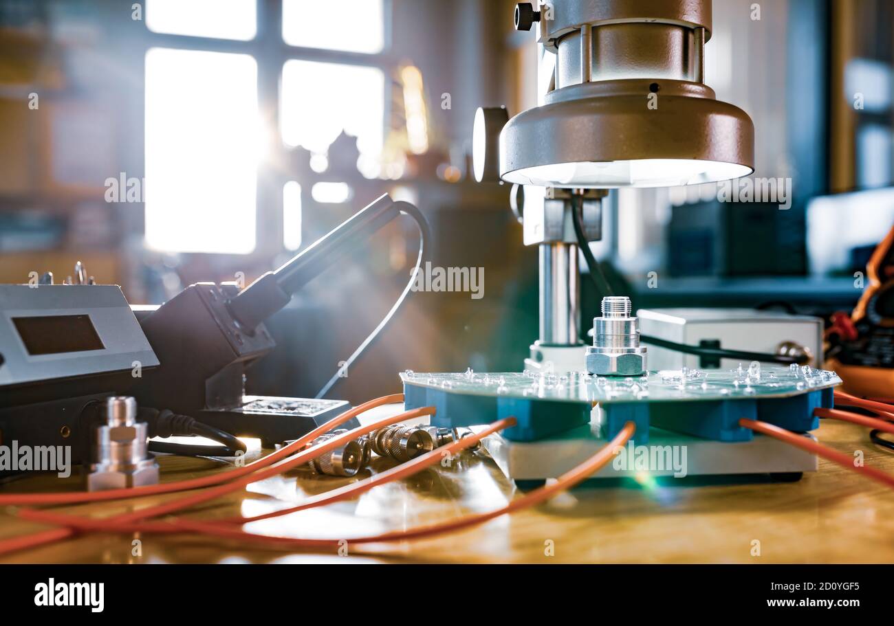 Large modern electron microscope. Microwave coaxial connector and ...