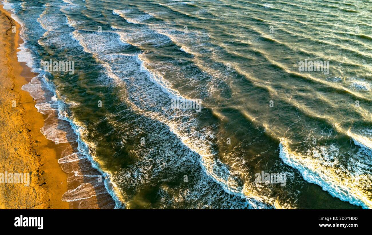 Aerial view waves on sand beach. Sea waves on the beautiful beach ...