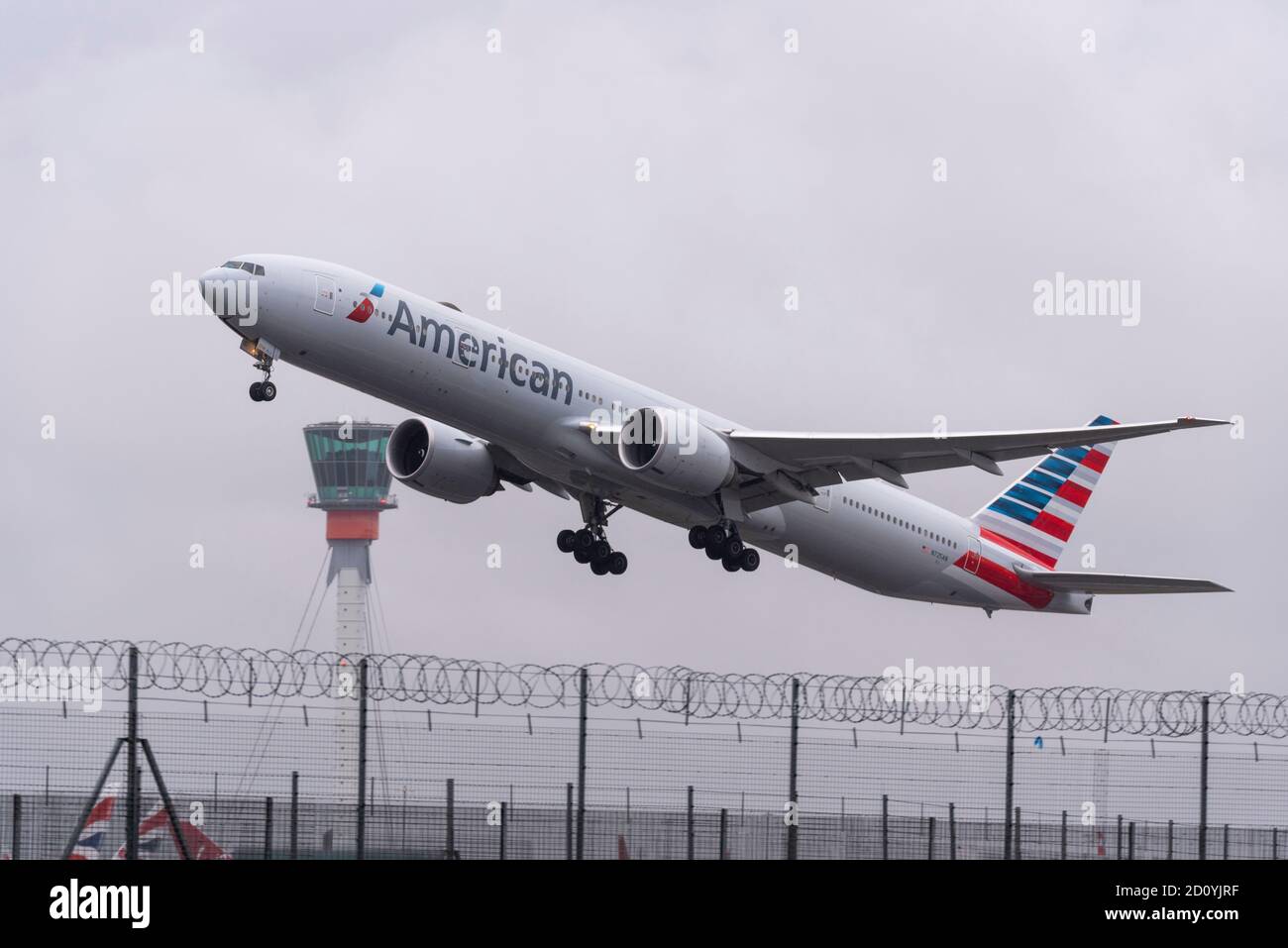 American Airlines Boeing 777 -300 jet airliner plane N725AN taking off ...